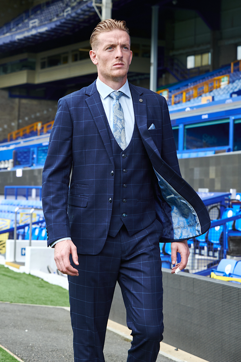 England goalkeeper Jordan Pickford in Edinson Navy Sky Suit – Marc Darcy